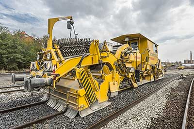 SSP 110 SW – Ballast distributing and profiling machine for turnout and ...